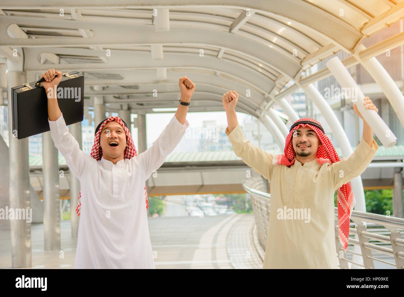 Sucess arab business people feeling happy with their work with city ...