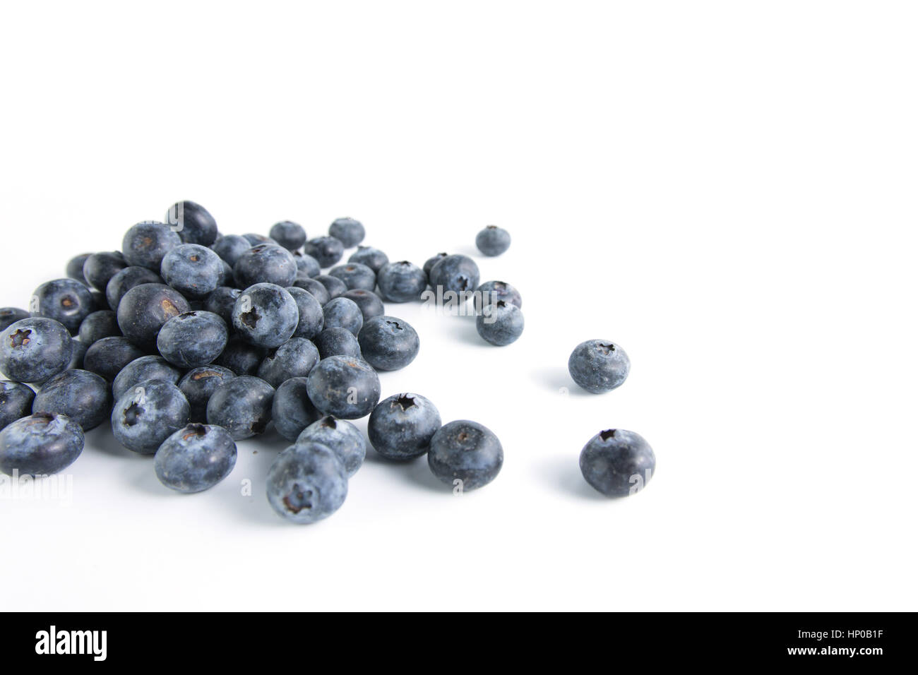 Sweet blueberry in white background Stock Photo - Alamy
