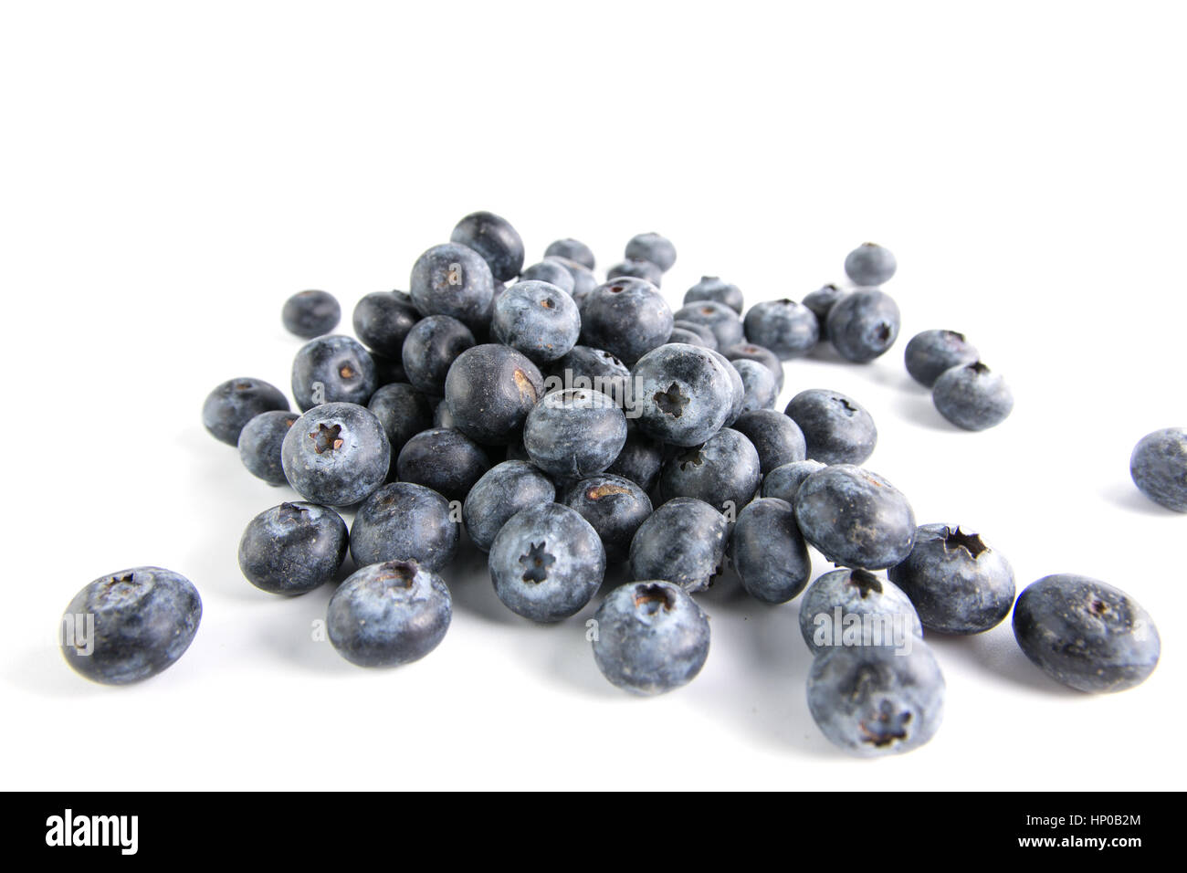 Sweet blueberry in white background Stock Photo - Alamy