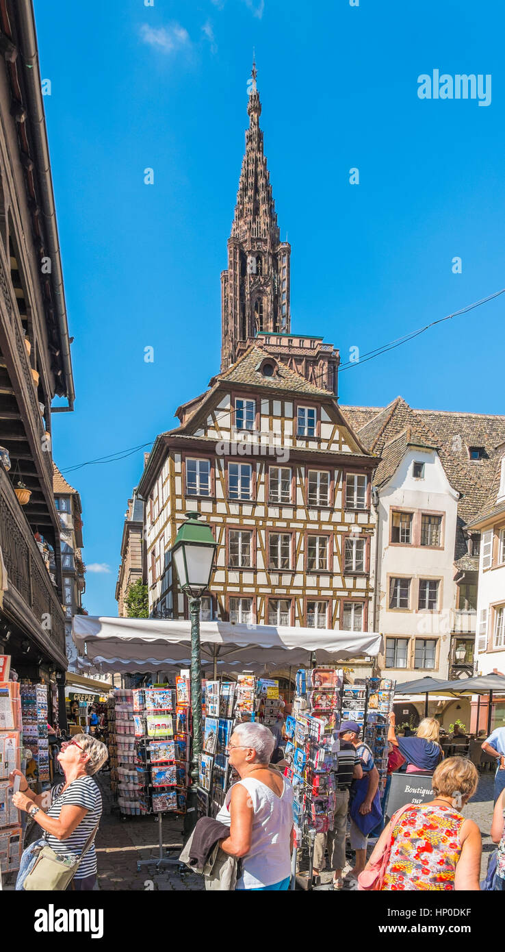 tourists in front of hat and souvenir shop, strasbourg, historic city ...