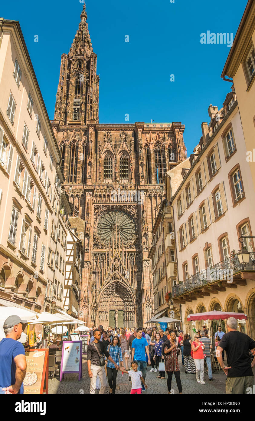 street scene in front of west facade of strasbourg cathedral seen from ...