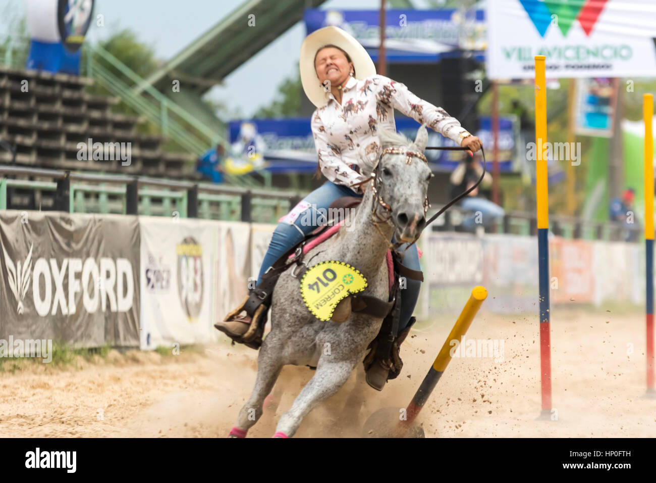 Pole bending race. Female rodeo competition celebrated in the Las ...