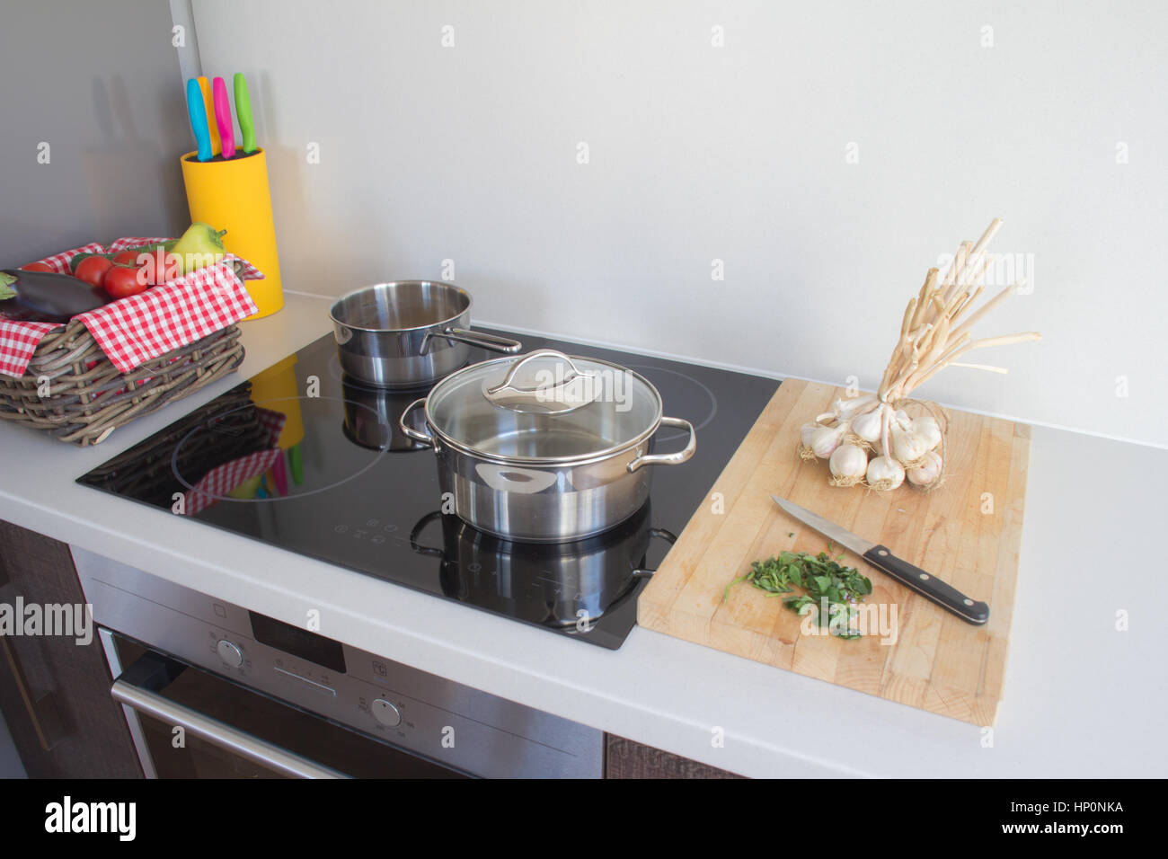 pots on kitchen stove Stock Photo - Alamy