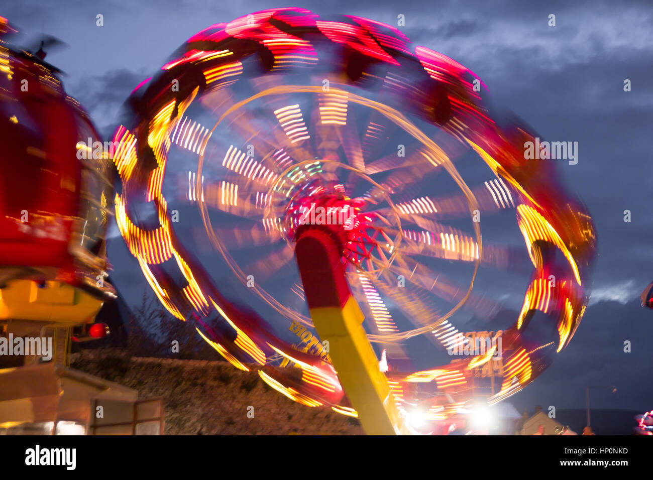carousel in night lights blur motion Stock Photo - Alamy