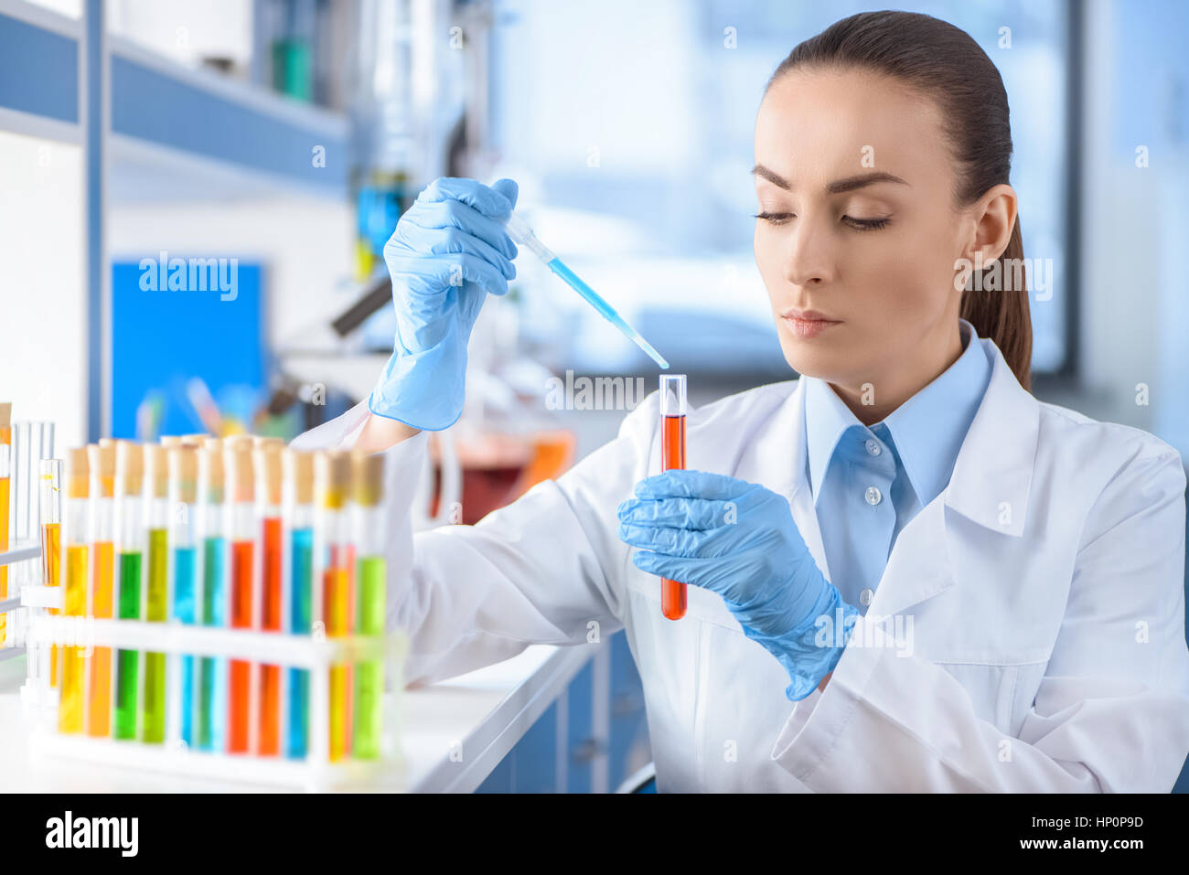 scientist working with laboratory tube Stock Photo - Alamy