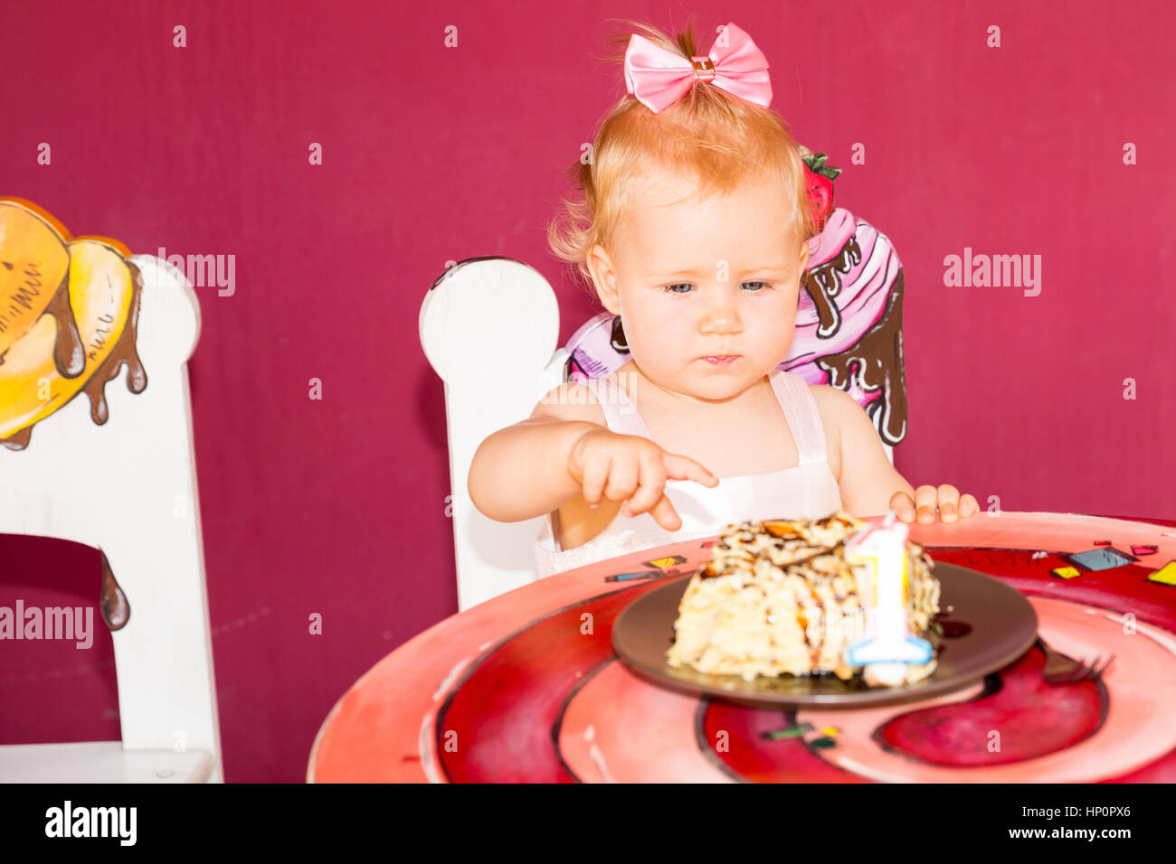 Little happy baby girl celebrating first birthday. Kid and her first ...