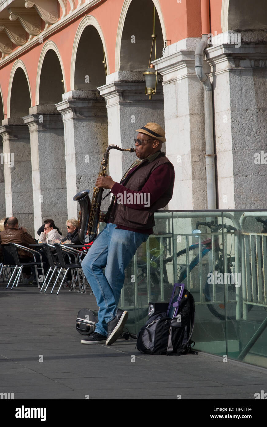 An artist busker playing jazz saxophone on the Massena Square, Nice ...