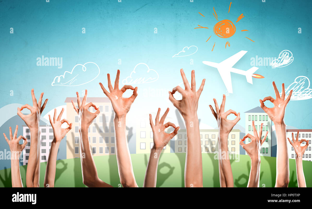 Row of raised hands showing different gestures Stock Photo - Alamy