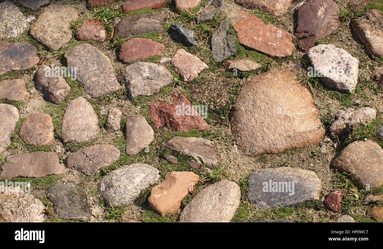 Pavement made of natural stones Stock Photo - Alamy