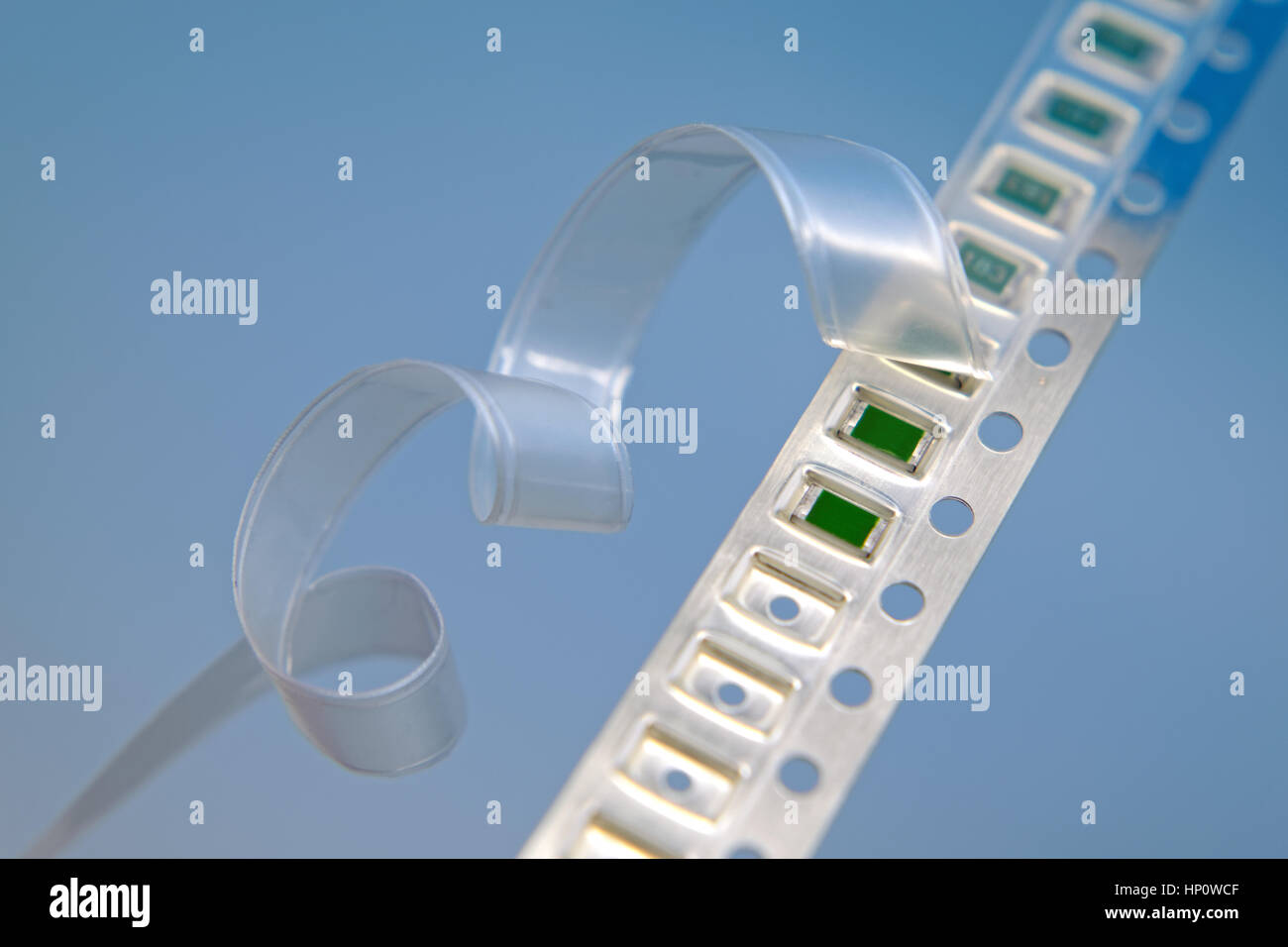 Surface mount components on a carrier tape Stock Photo - Alamy