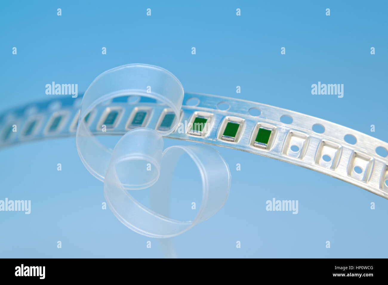 Surface mount components on a carrier tape Stock Photo - Alamy