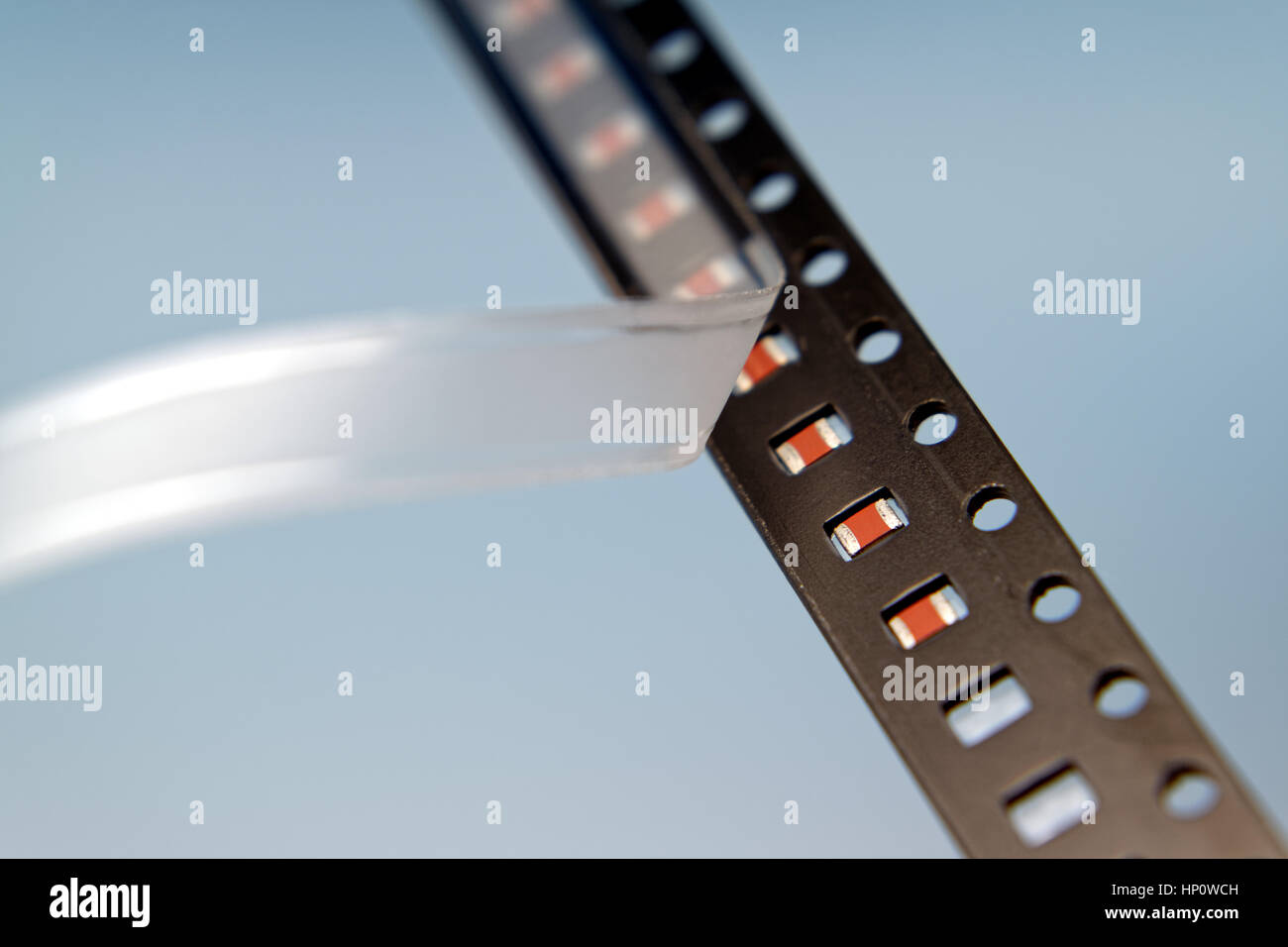 Surface mount components on a carrier tape Stock Photo - Alamy