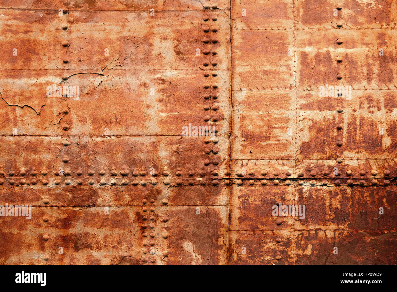 Old rusted ship hull fragment, iron sheets with rivets, background ...
