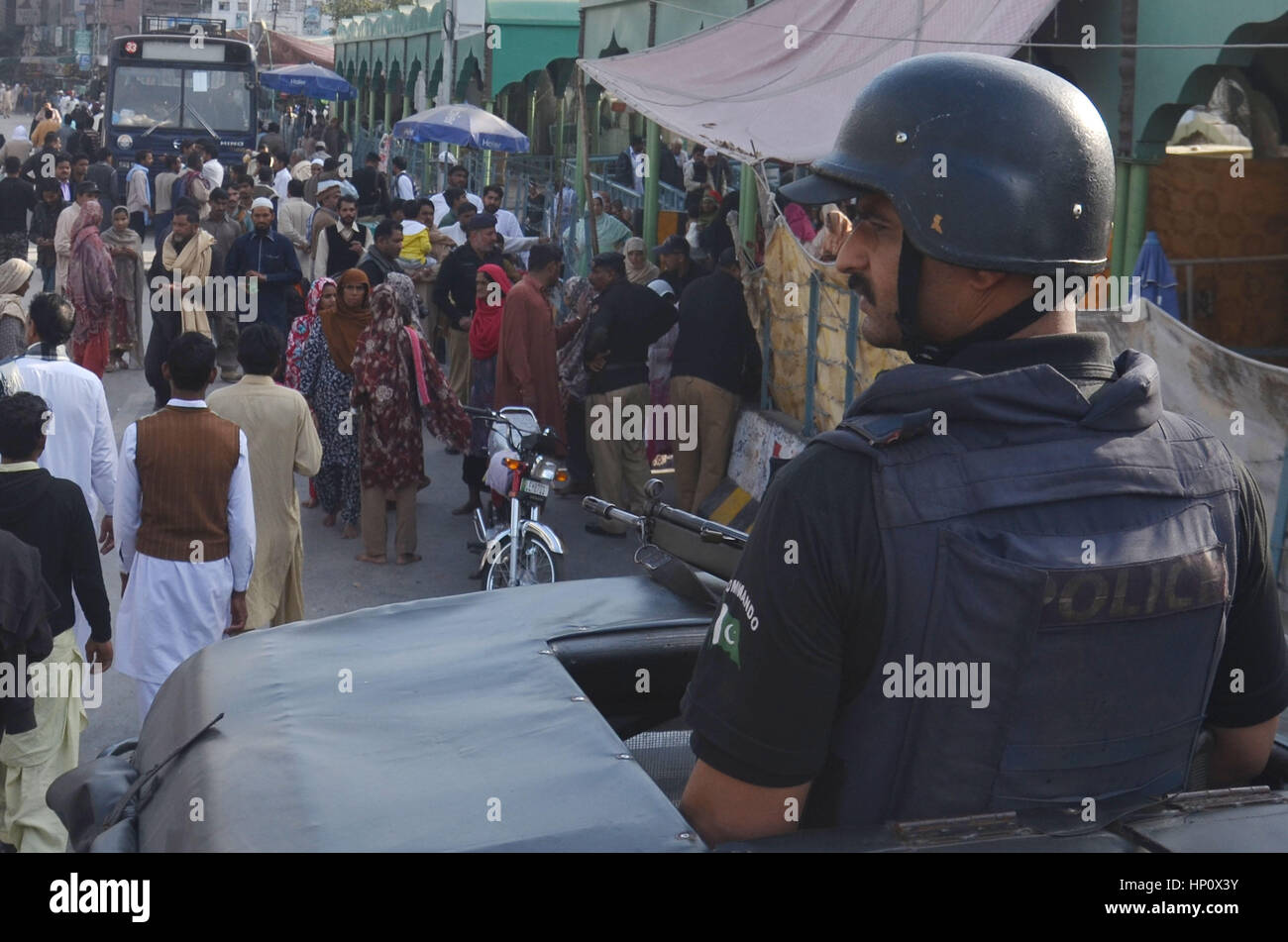 Lahore, Pakistan. 17th Feb, 2017. Pakistani security officials stand ...