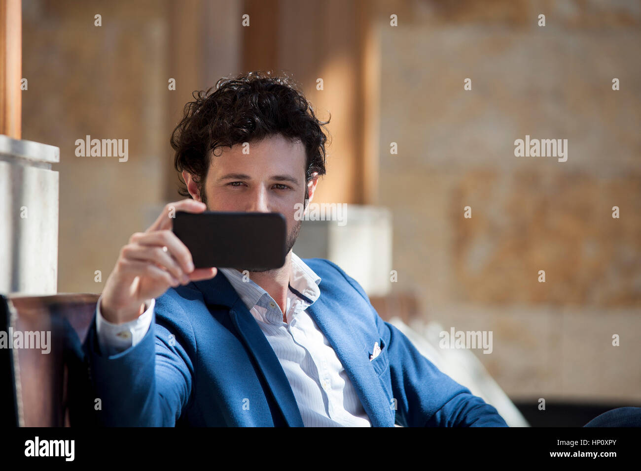 Man uses smartphone take photo hi-res stock photography and images - Alamy