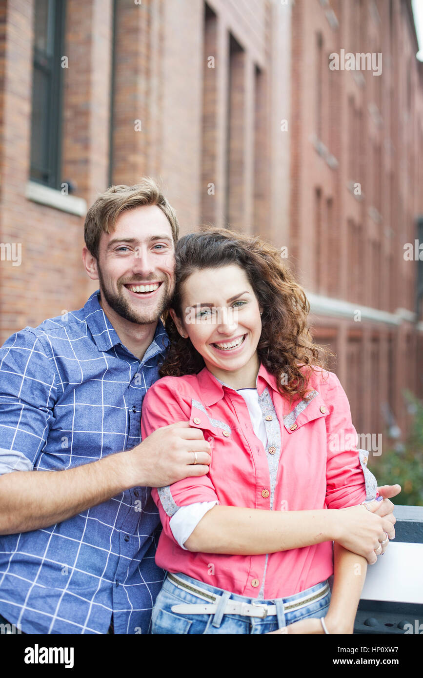 Couple together outdoors, portrait Stock Photo - Alamy