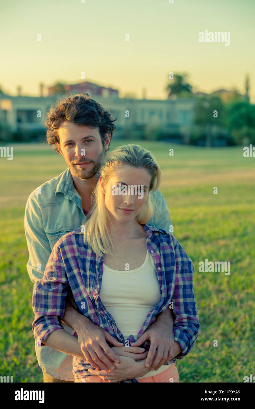 Couple together outdoors, portrait Stock Photo - Alamy