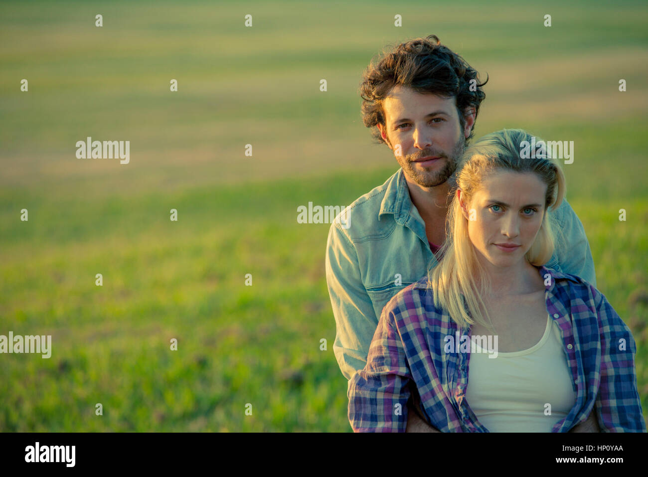 Couple together outdoors, portrait Stock Photo - Alamy