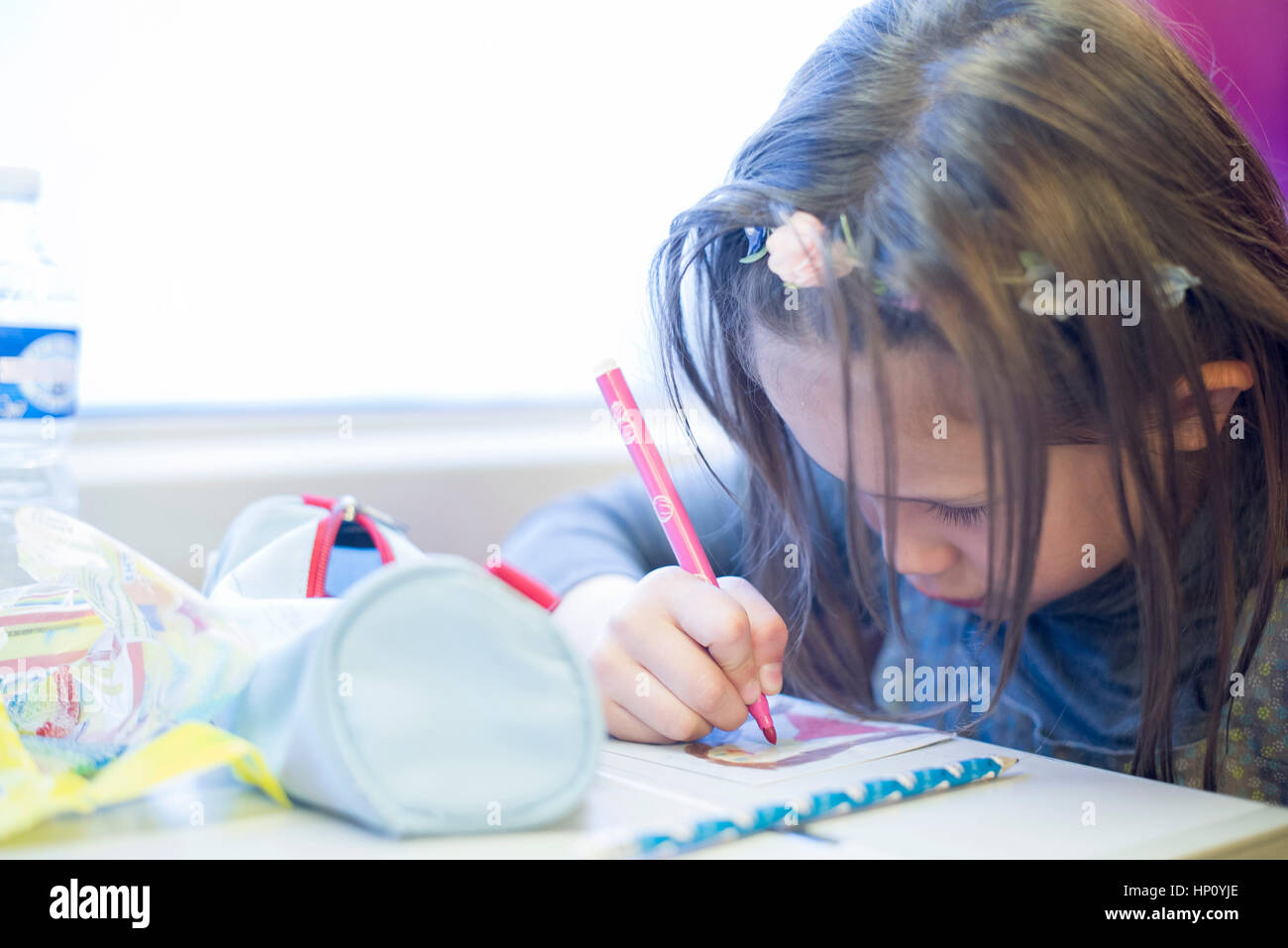 Little girl coloring Stock Photo - Alamy