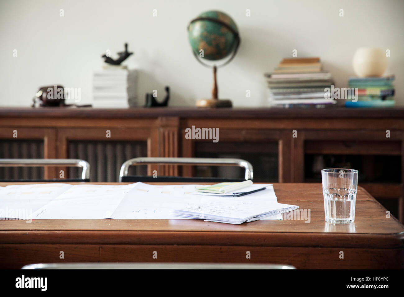 Blueprints on table in office Stock Photo - Alamy
