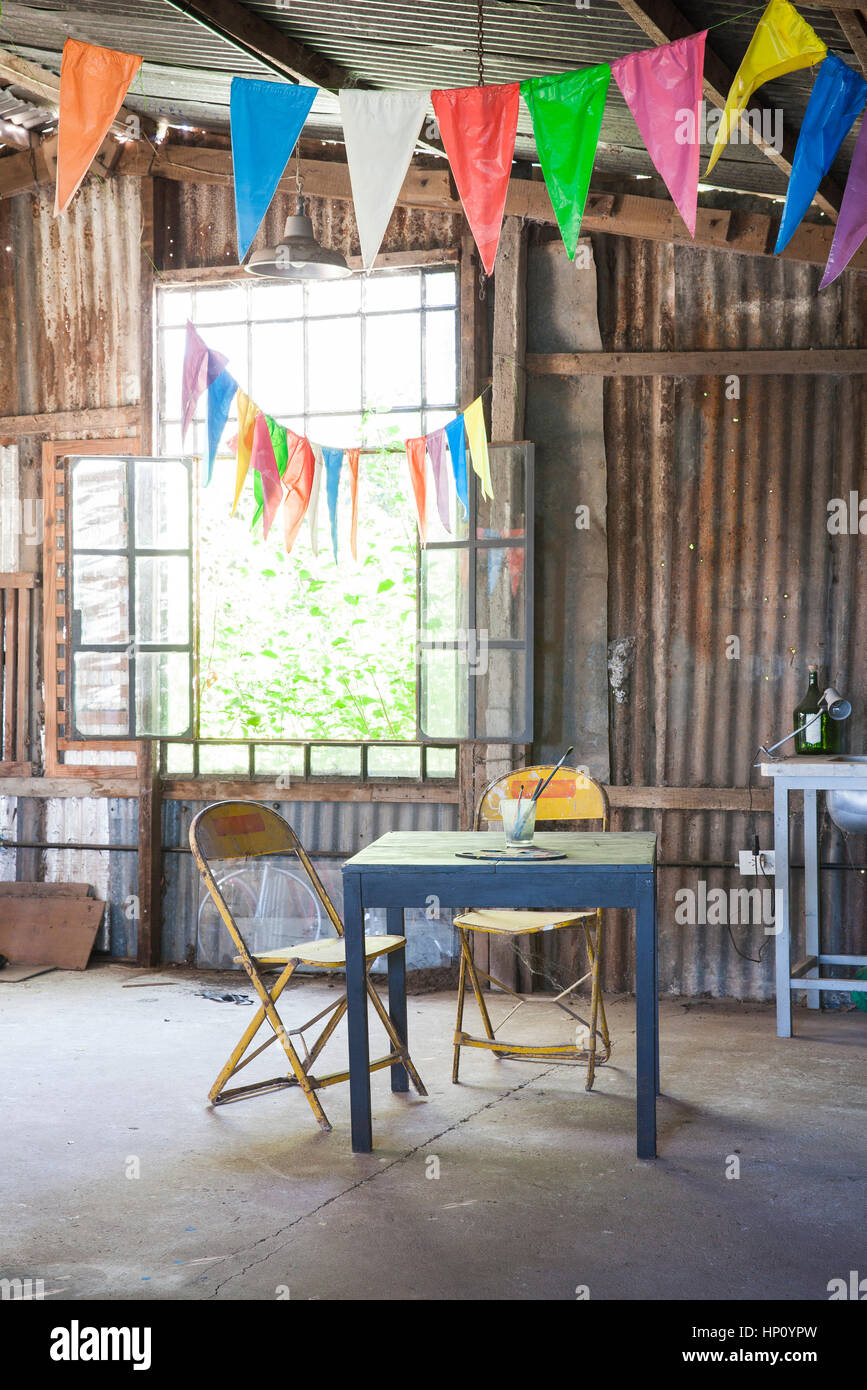 Workshop decorated with pennant streamers Stock Photo - Alamy