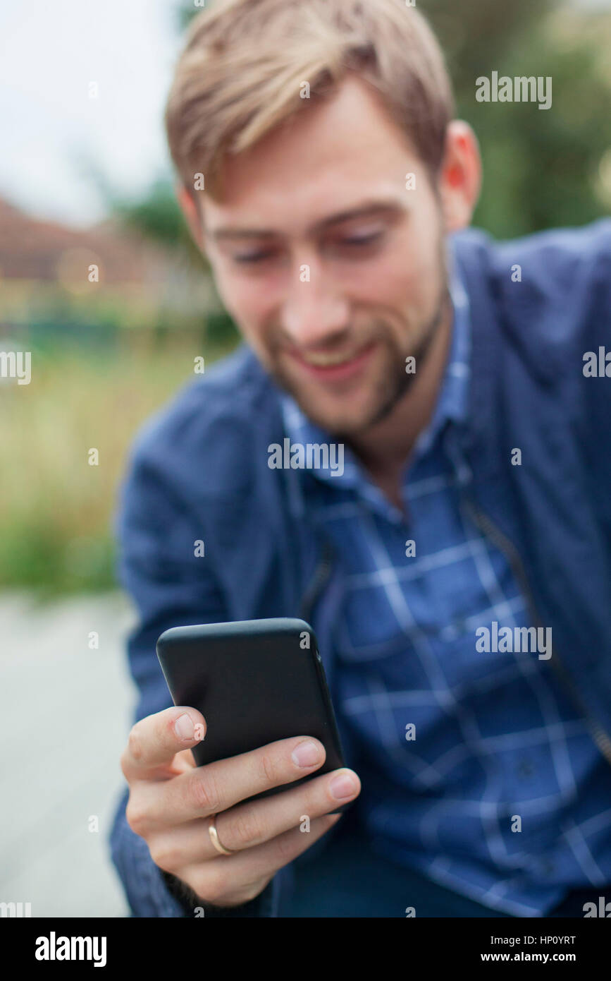 Caucasian man phones smartphone hi-res stock photography and images - Alamy