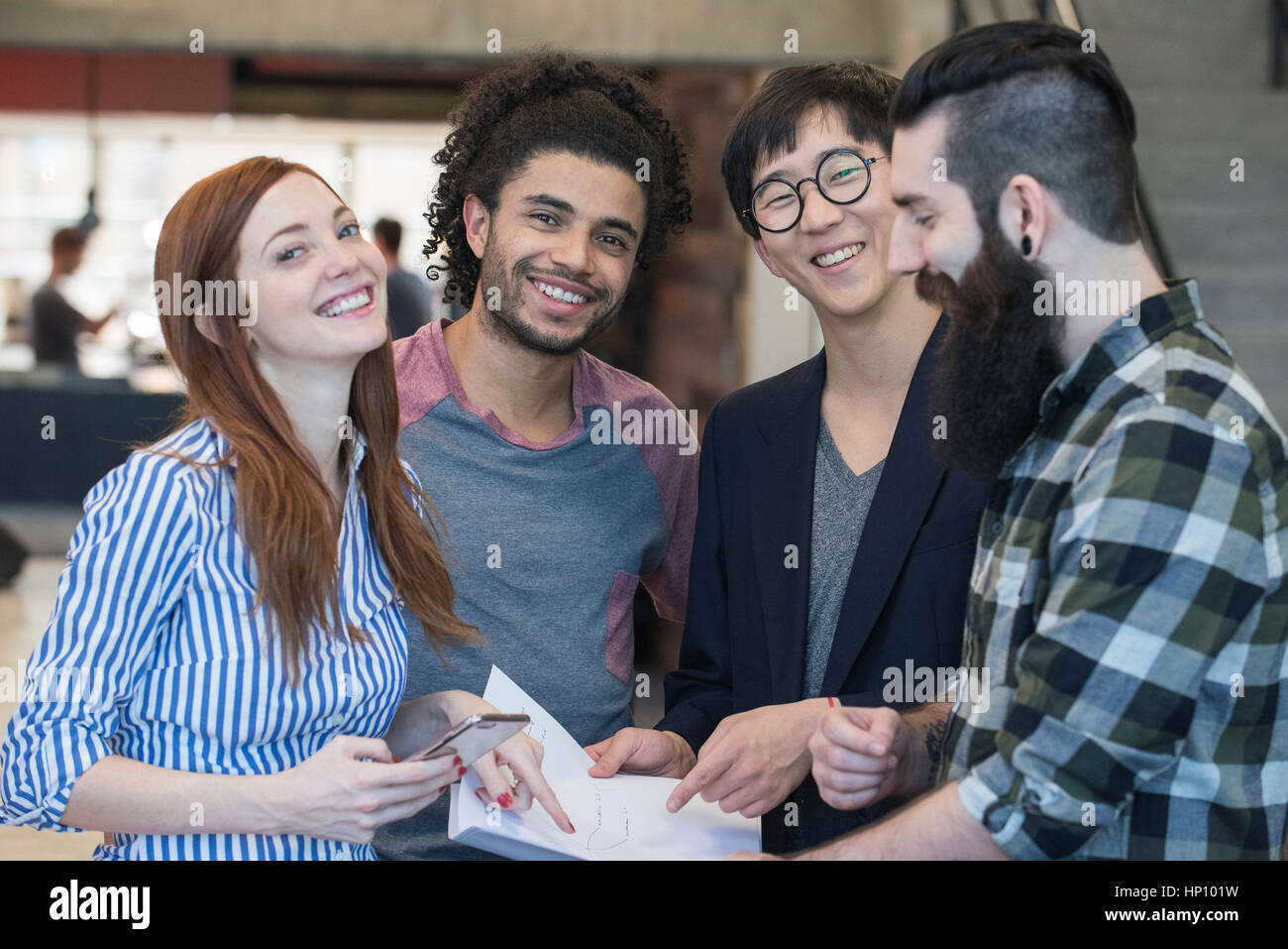 Young professionals collaborating on hi-res stock photography and ...