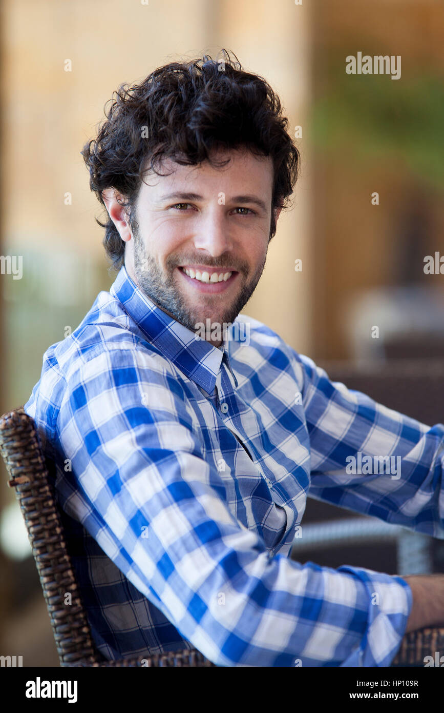 Man smiling cheerfully, portrait Stock Photo - Alamy