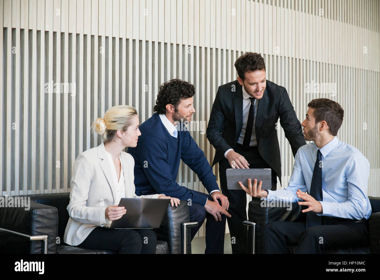 Team members collaborating on hi-res stock photography and images - Alamy