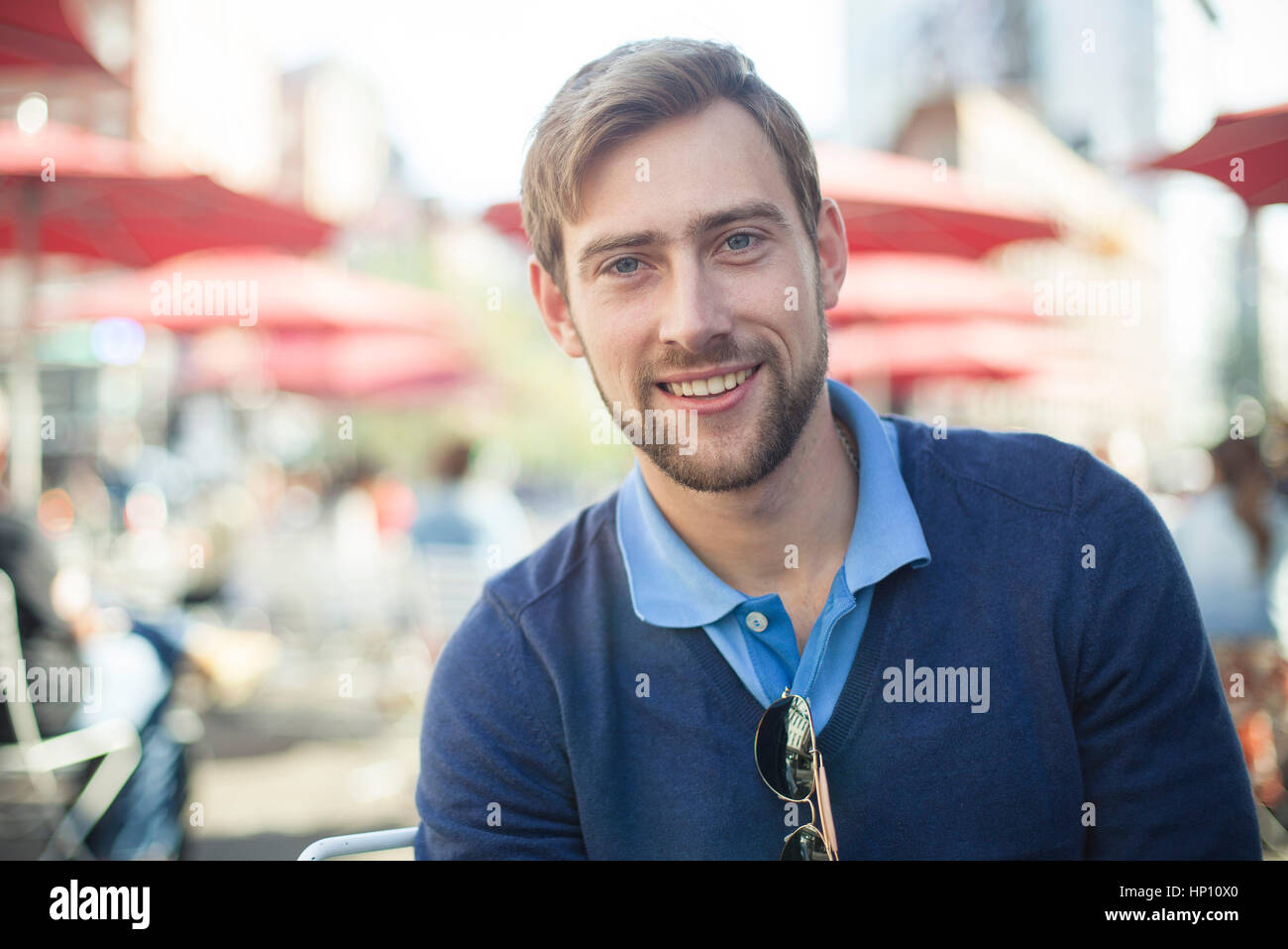 Young man smiling outdoors, portrait Stock Photo - Alamy