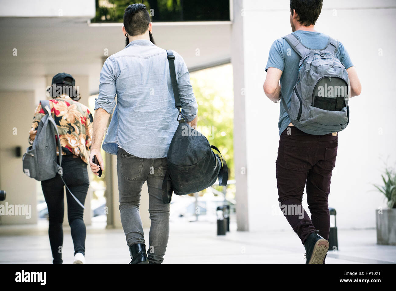 College students walking on campus, rear view Stock Photo - Alamy