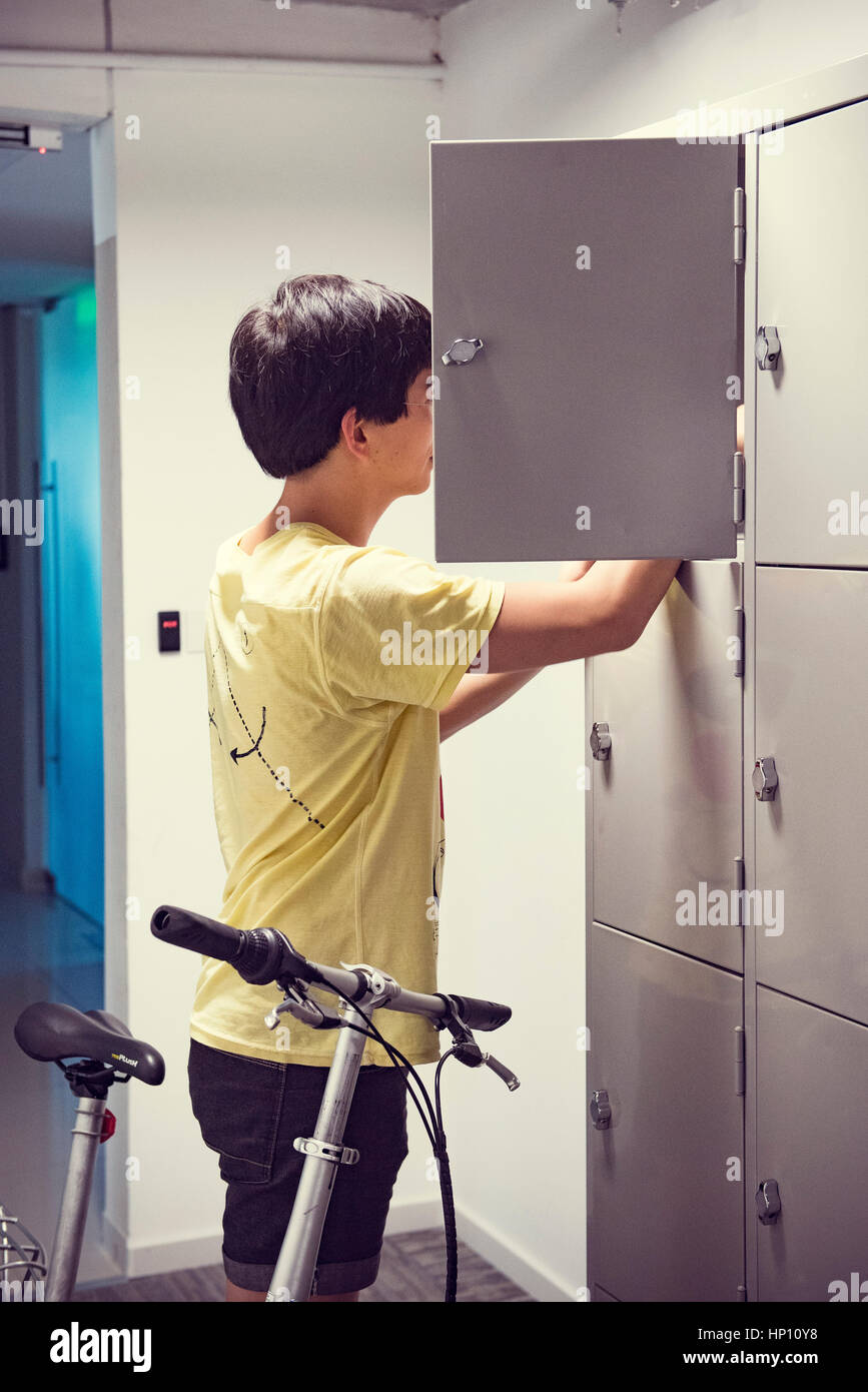 Student opening school locker hi-res stock photography and images - Alamy