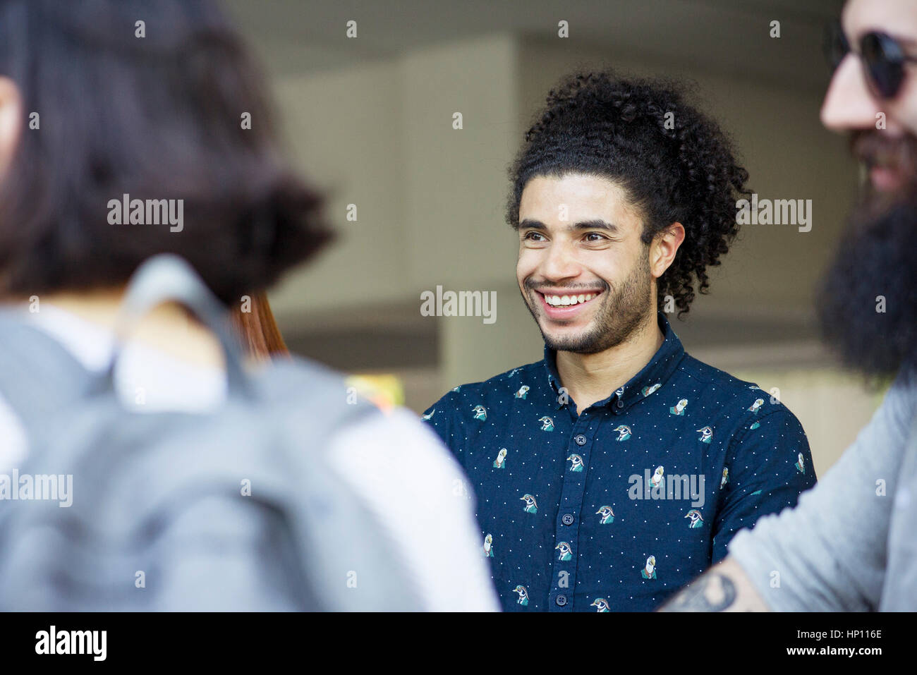 Man hanging out with friends Stock Photo - Alamy