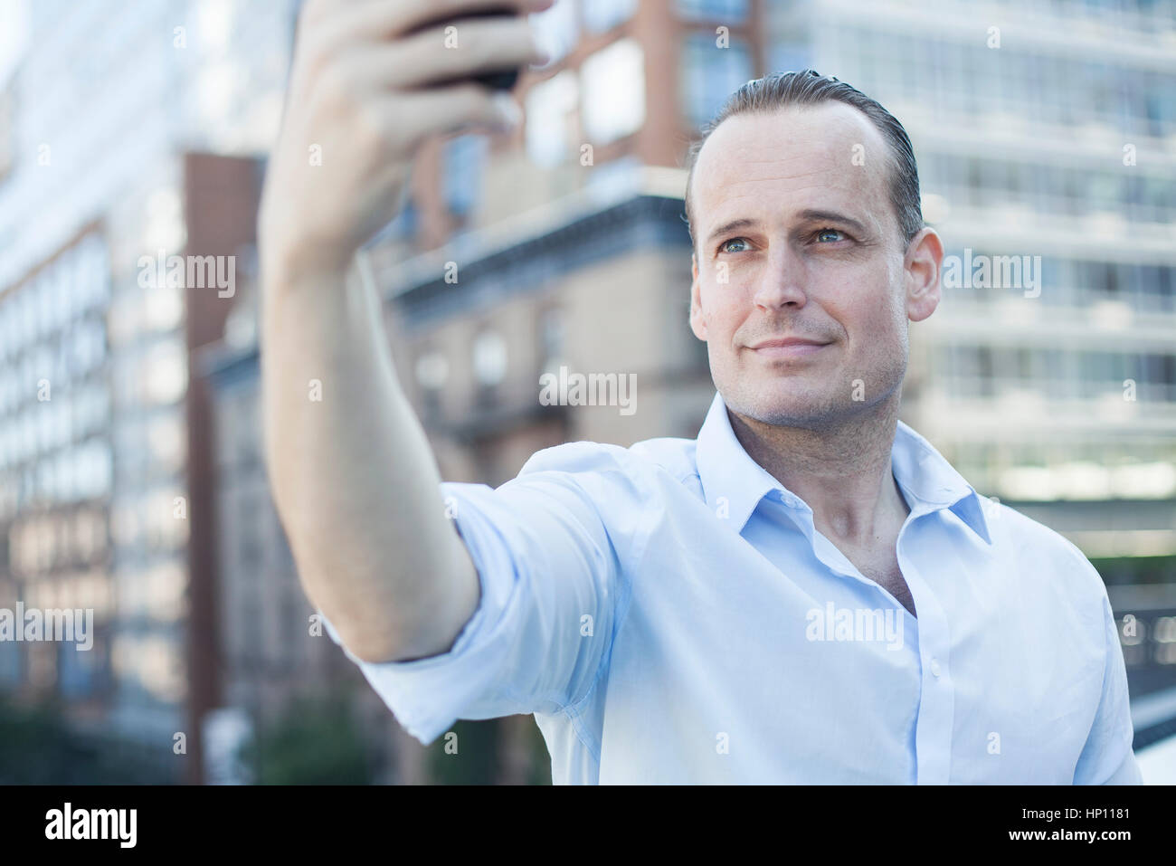 Man posing for a selfie Stock Photo - Alamy