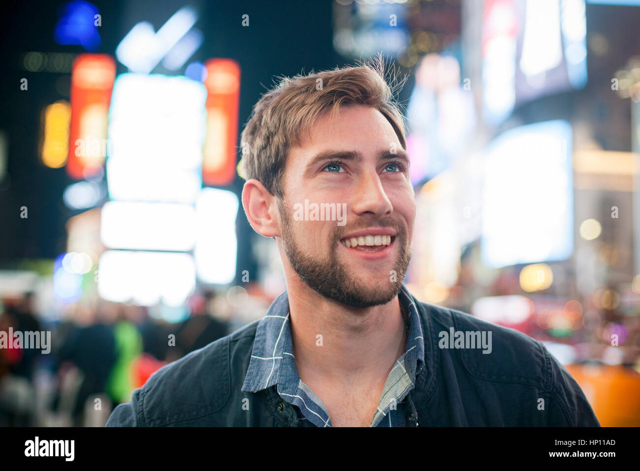 Young man amazed by his surroundings, Times Square, New York City, New ...