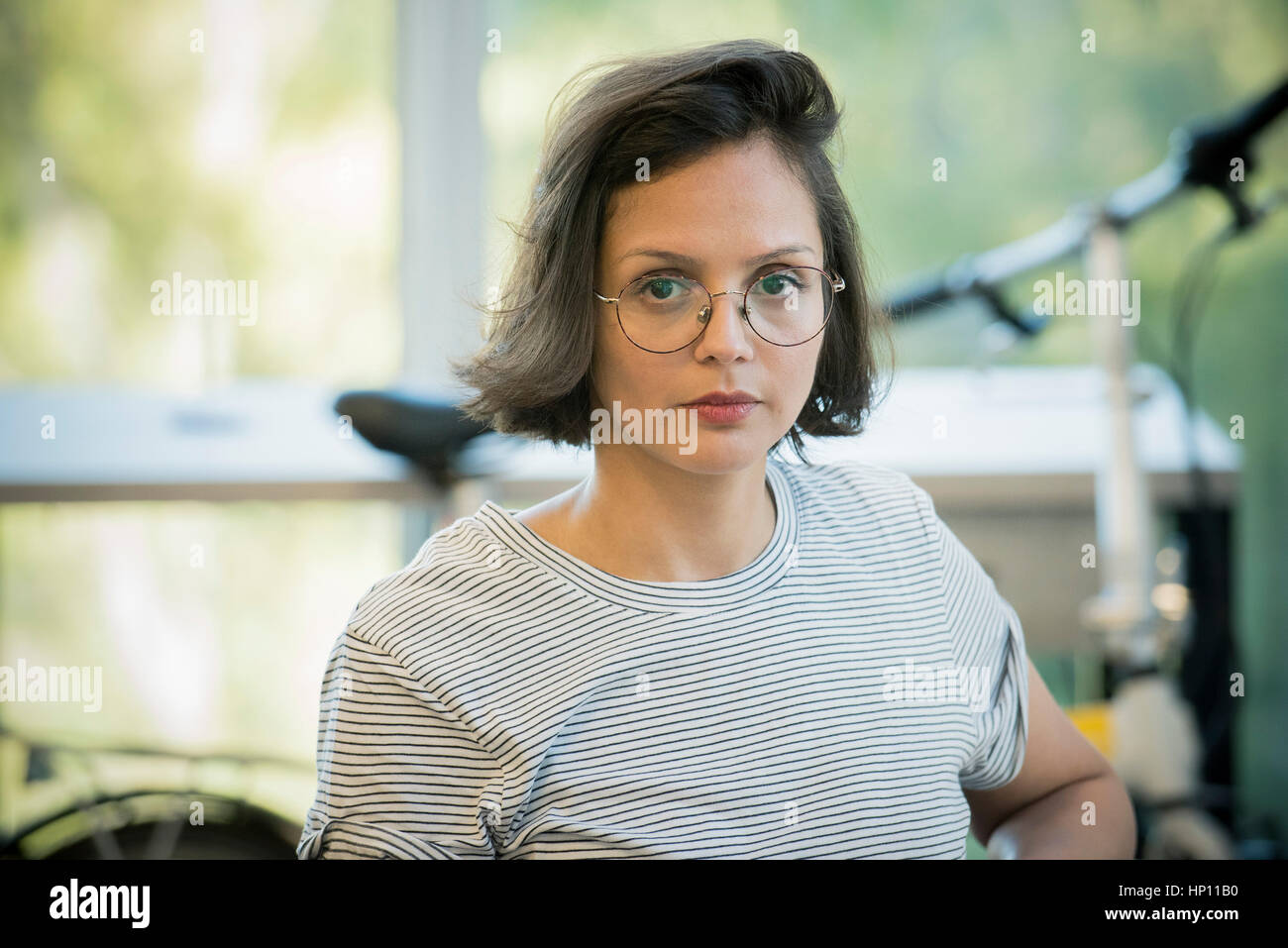 Woman with serious expression, portrait Stock Photo - Alamy