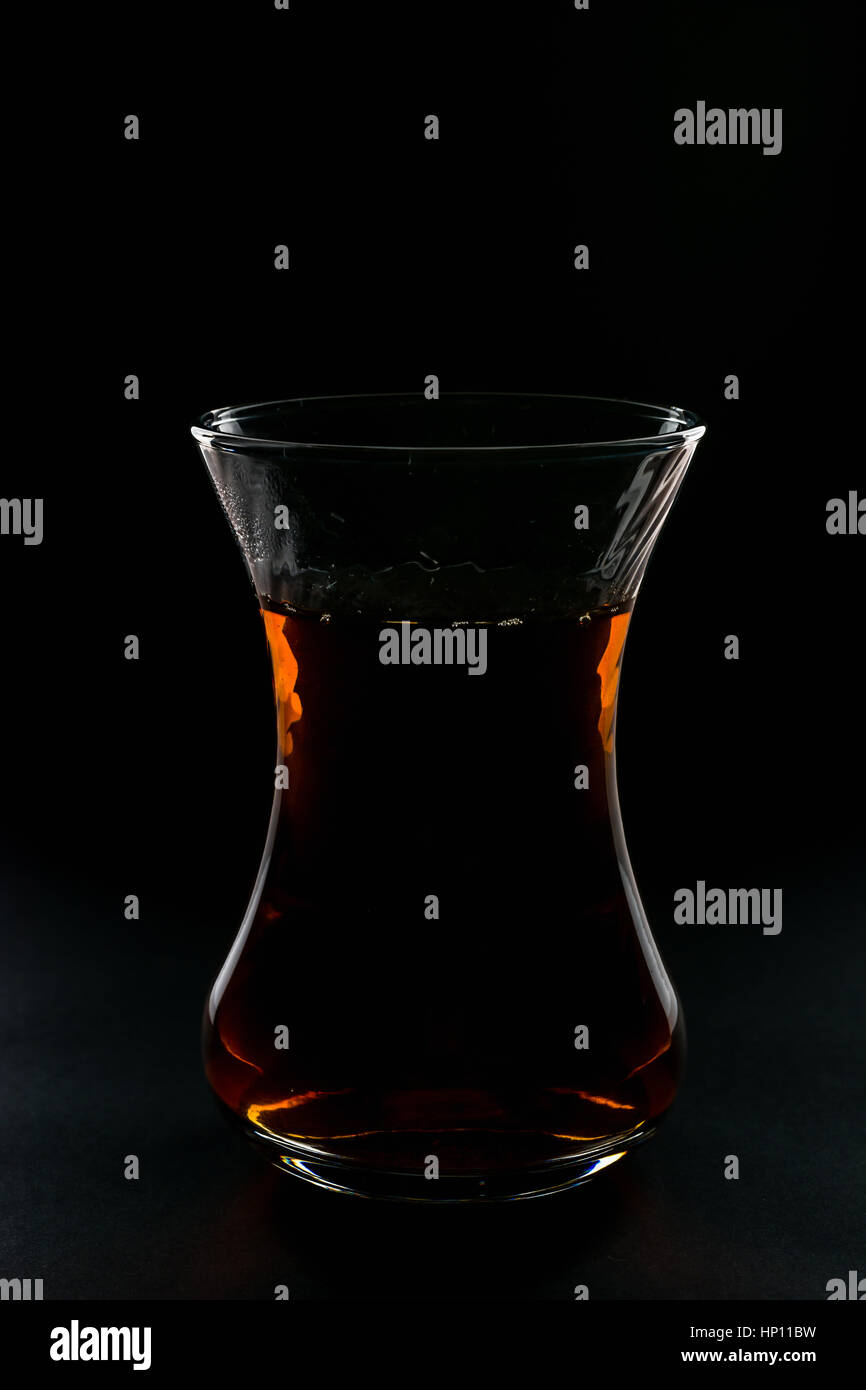 Cup of tea black background Stock Photo - Alamy