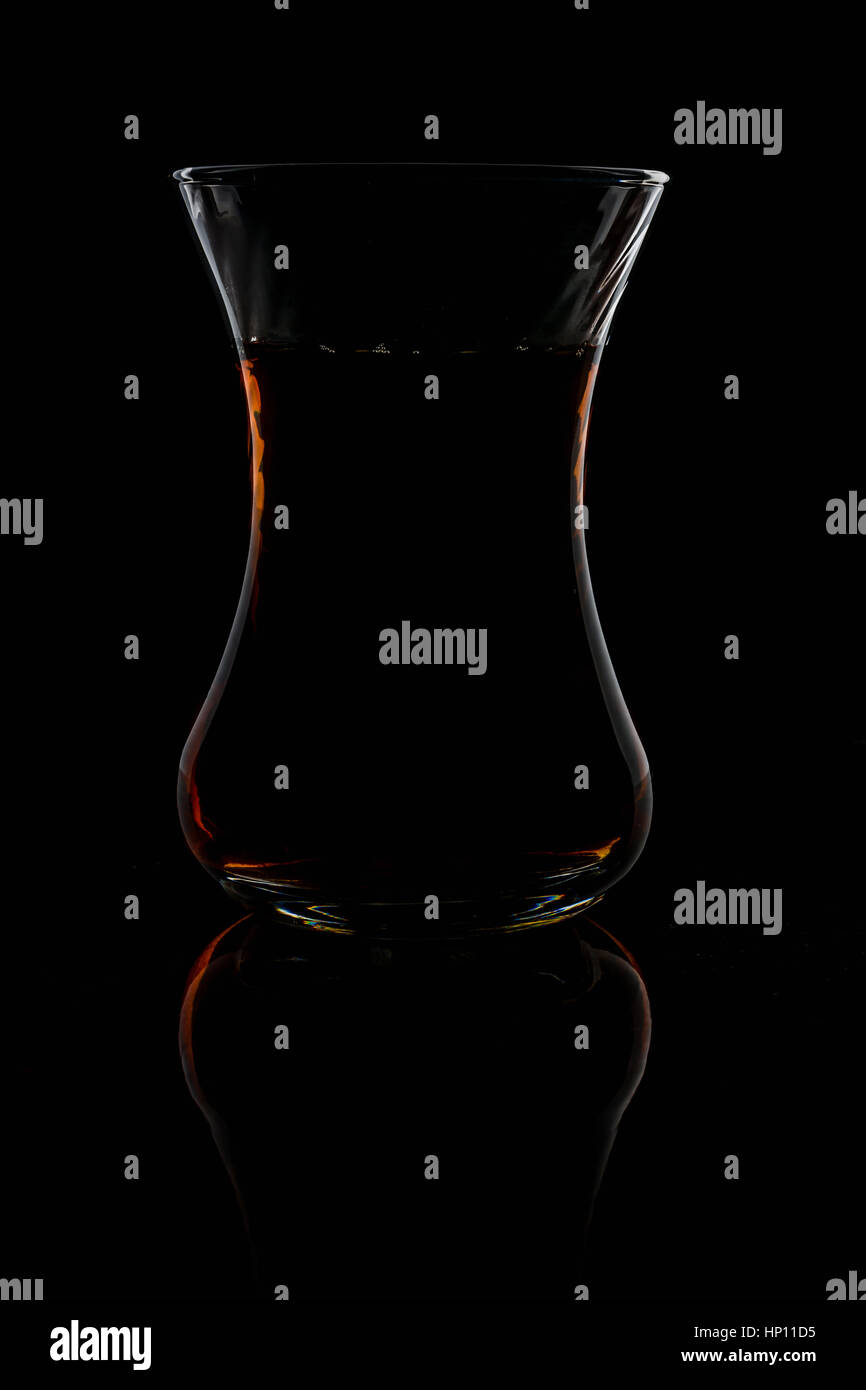 Cup of tea black background Stock Photo - Alamy