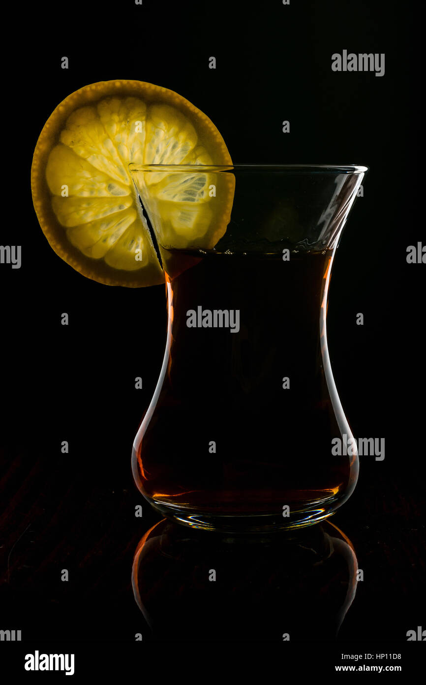 Cup of tea black background Stock Photo - Alamy