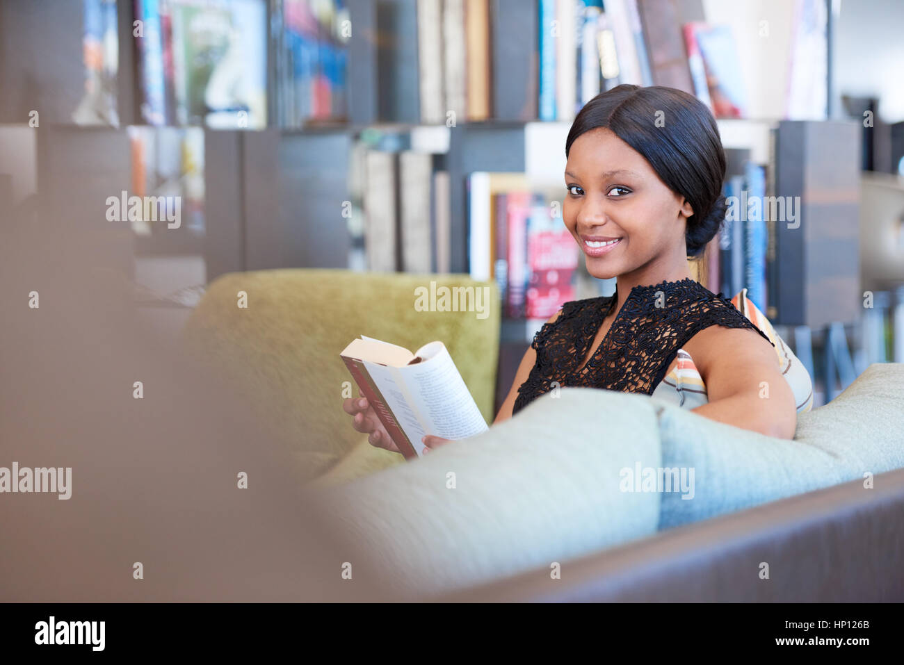 African woman reading a book hi-res stock photography and images - Alamy