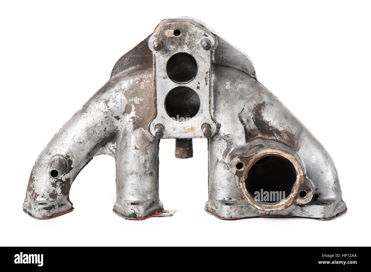 closeup intake manifolds on wooden desk Stock Photo - Alamy