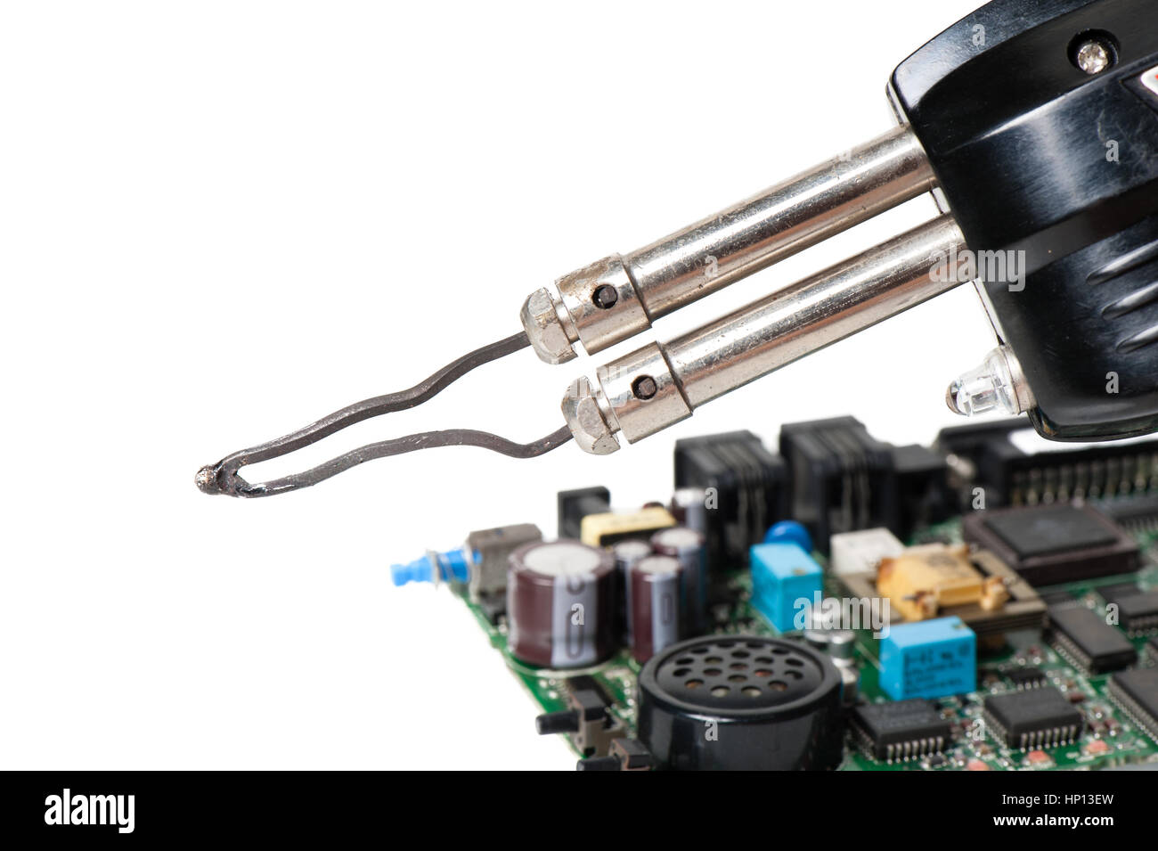 closeup old soldering iron on white background Stock Photo - Alamy