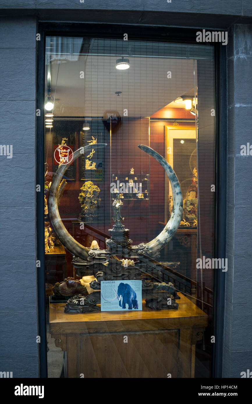 Ivory shop selling carved ivory and other antiques in Hong Kong Stock ...