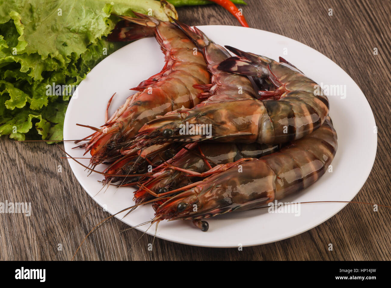 Raw big tiger prawn - ready for cooking Stock Photo - Alamy