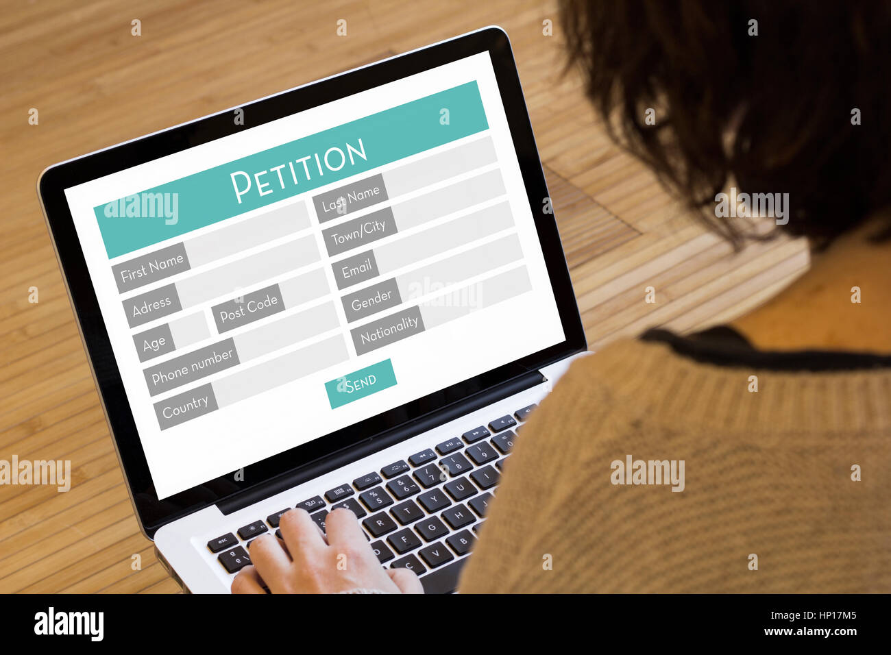 Young woman making an online petition form on a web in laptop. All ...