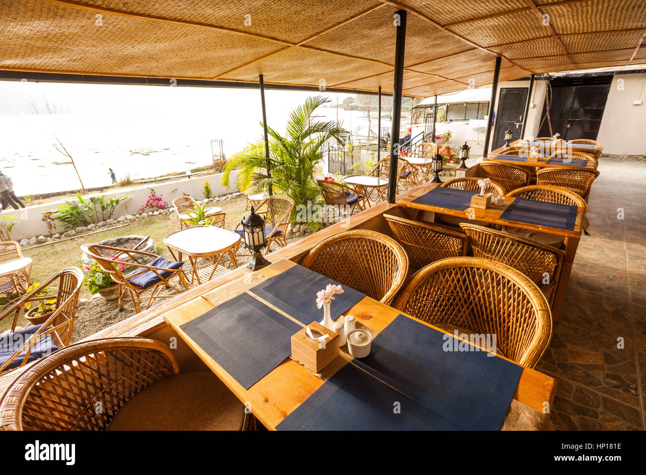 Tables at a cafe next to Fewa (Phewa) Lake, Pokhara, Nepal Stock Photo ...