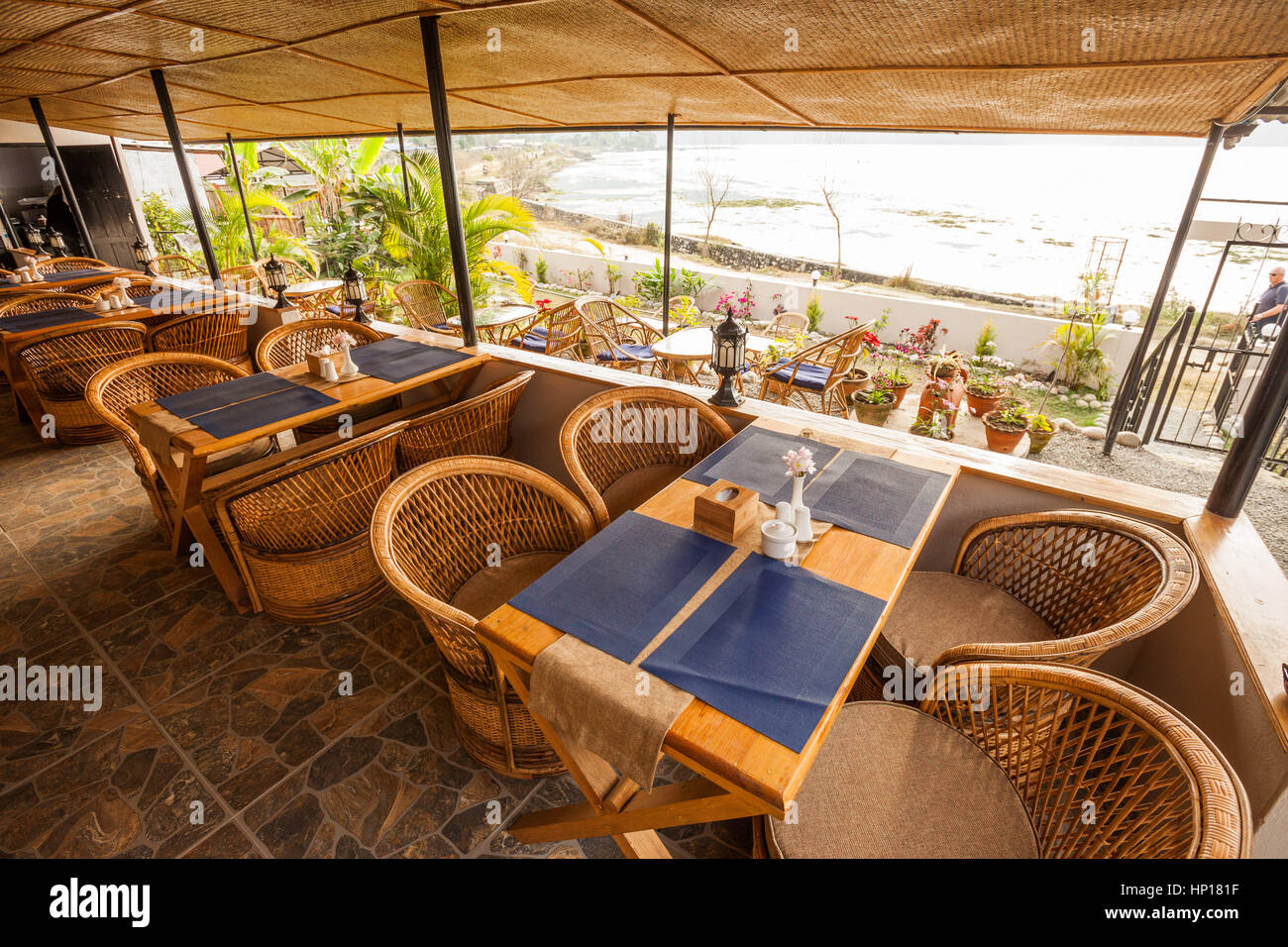 Tables at a cafe next to Fewa (Phewa) Lake, Pokhara, Nepal Stock Photo ...