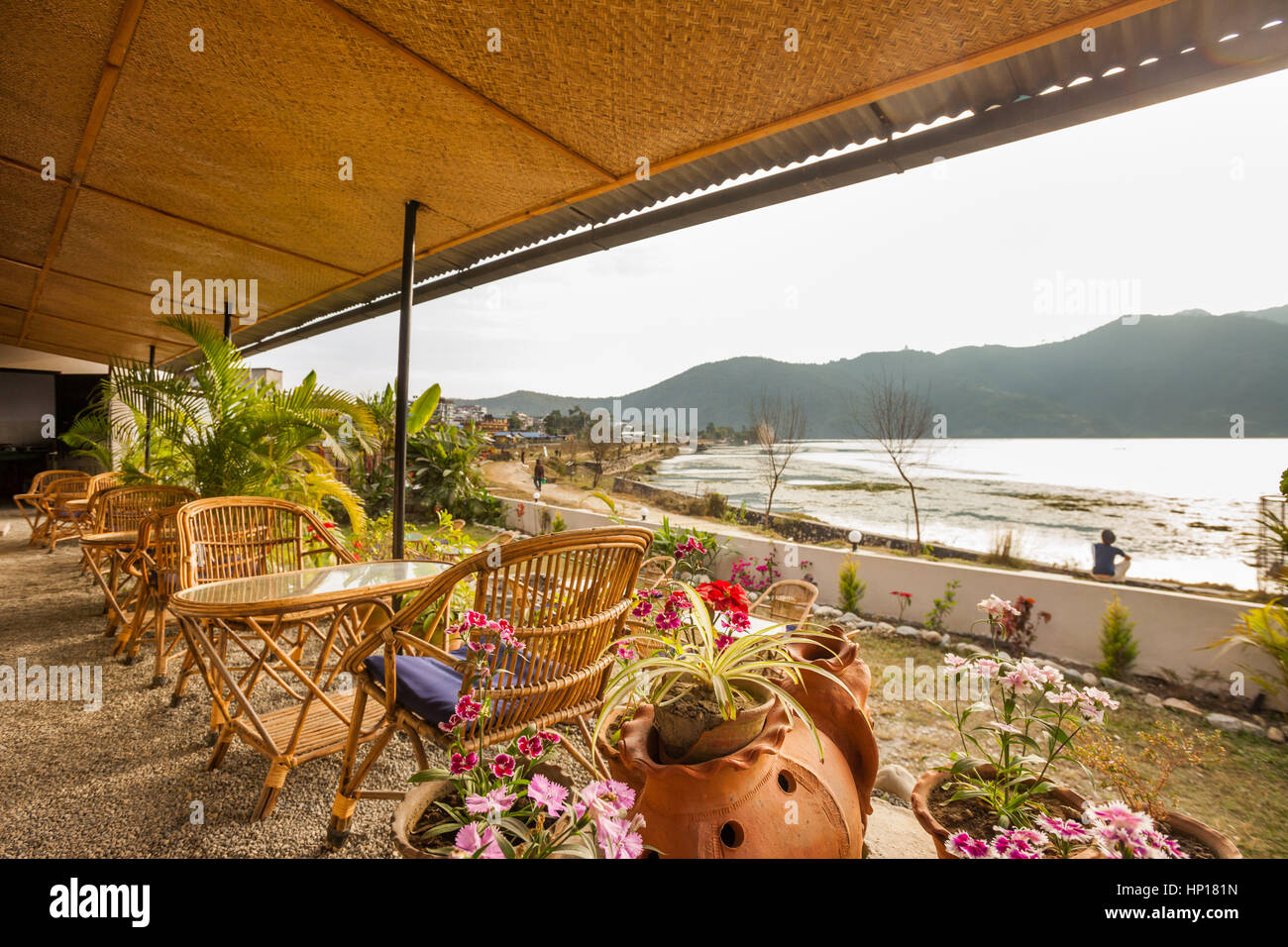 Tables at a cafe next to Fewa (Phewa) Lake, Pokhara, Nepal Stock Photo ...