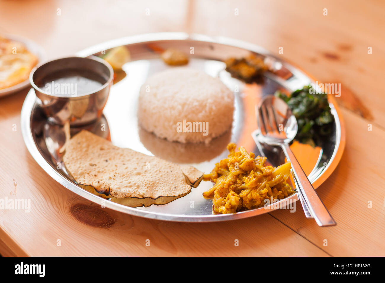 A Nepali Thali (Dal Bhat) set made with ingredients from Upper Mustang ...