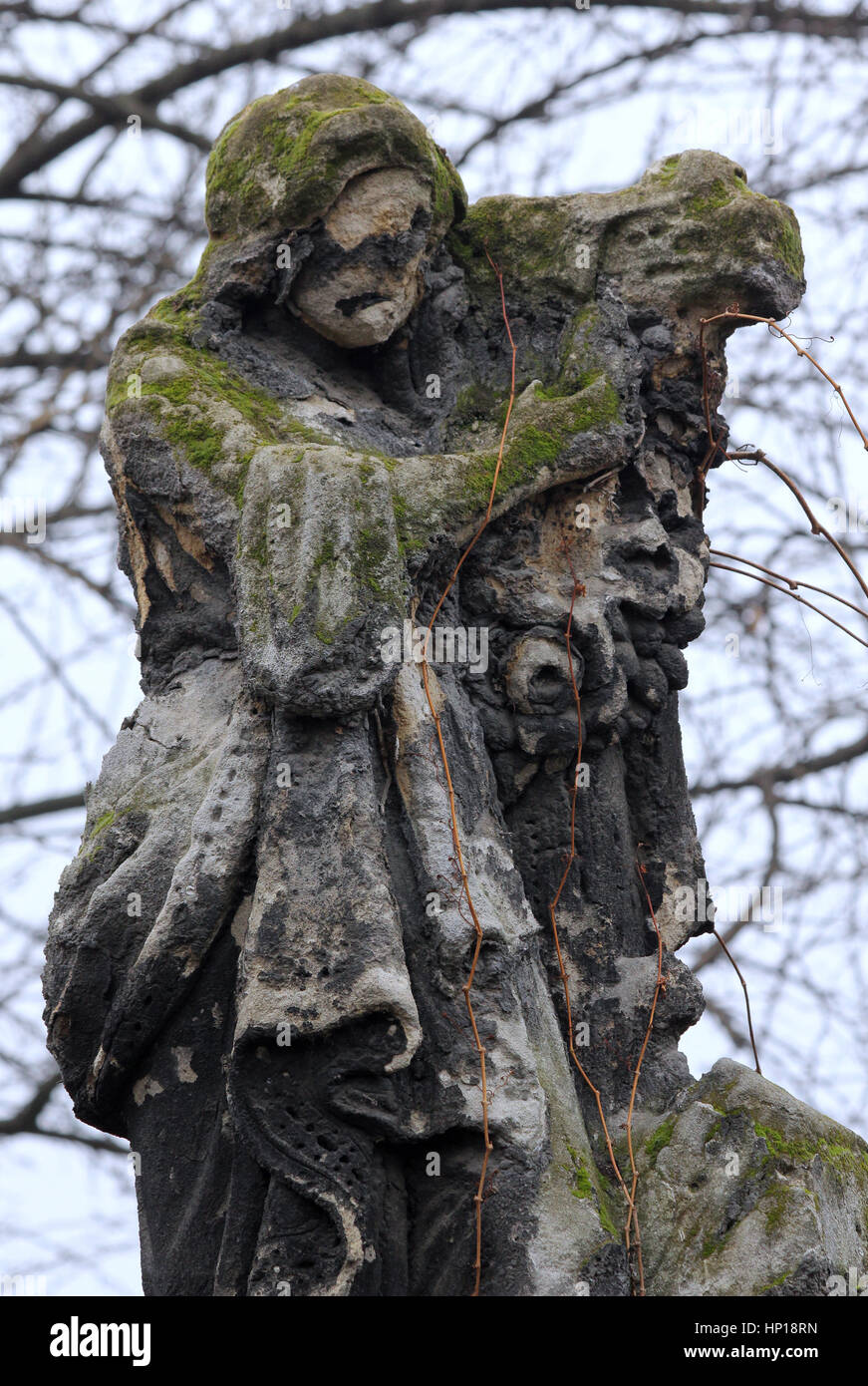 Eroded cemetery tombstone sculpture Stock Photo - Alamy